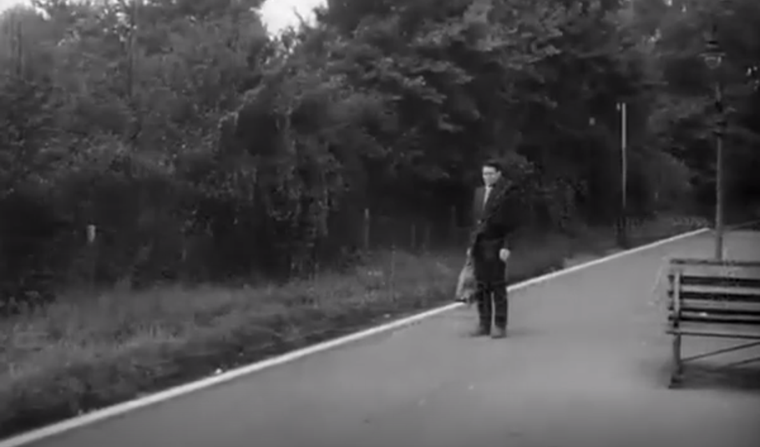 Having returned to the station, Derrick Sherwin stands alone on the ...